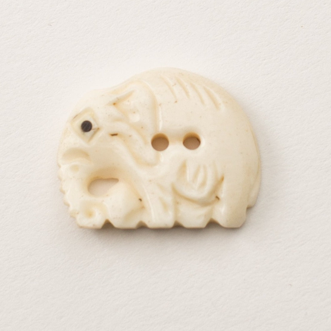 Handcarved Bone Button - Elephant Spirit– MAIWA