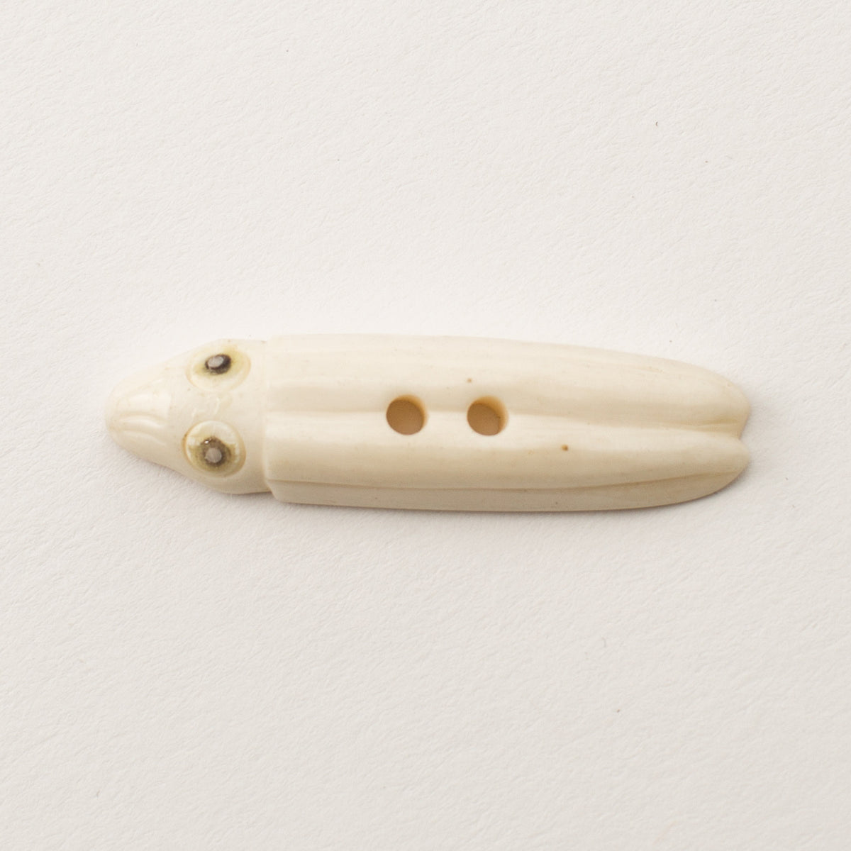 Handcarved Bone Button - White Long Beetle– MAIWA